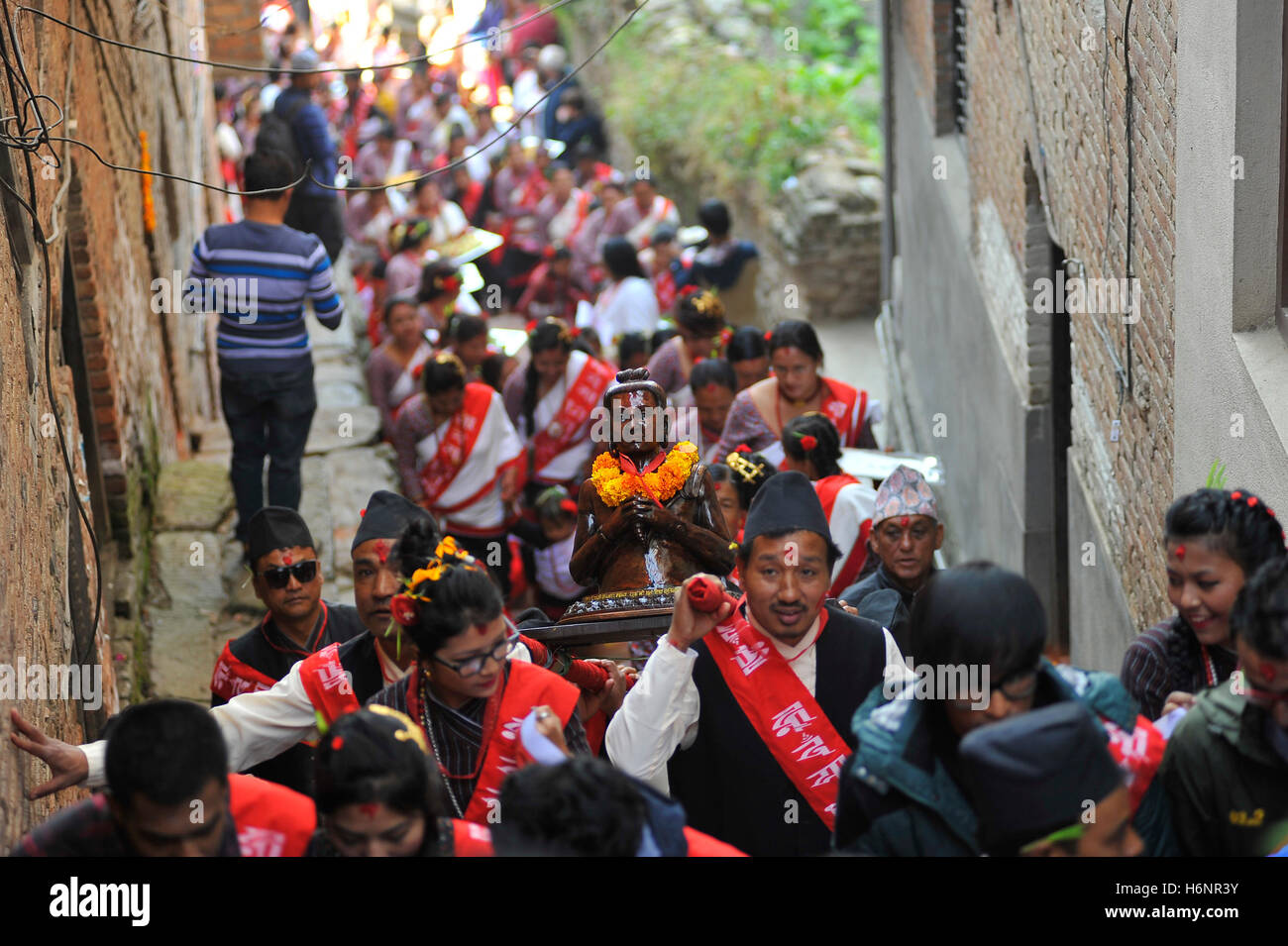 Kathmandu, Nepal. 31st Oct, 2016. Newari people carrying statue of ...