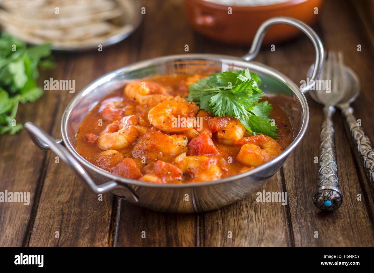 Indian prawn curry with rice and chapatis Stock Photo - Alamy