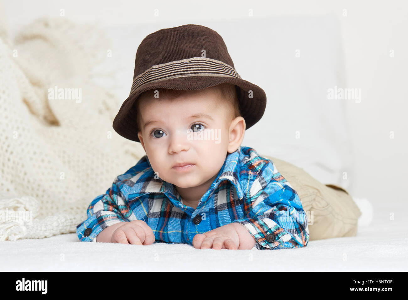 Baby in plaid hi-res stock photography and images - Alamy