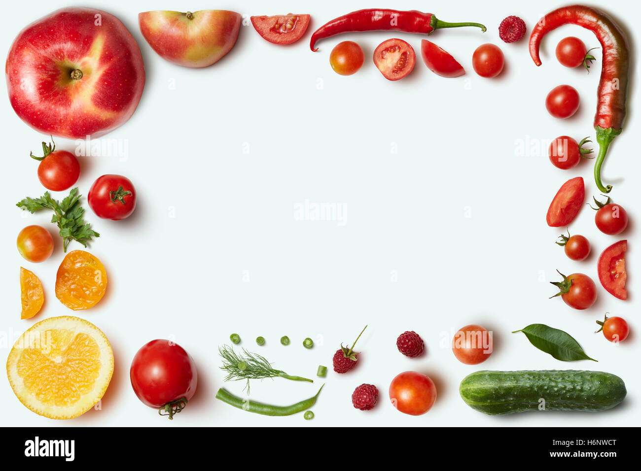 Frame of vegetables and fruits on white background. Unusual place for ...