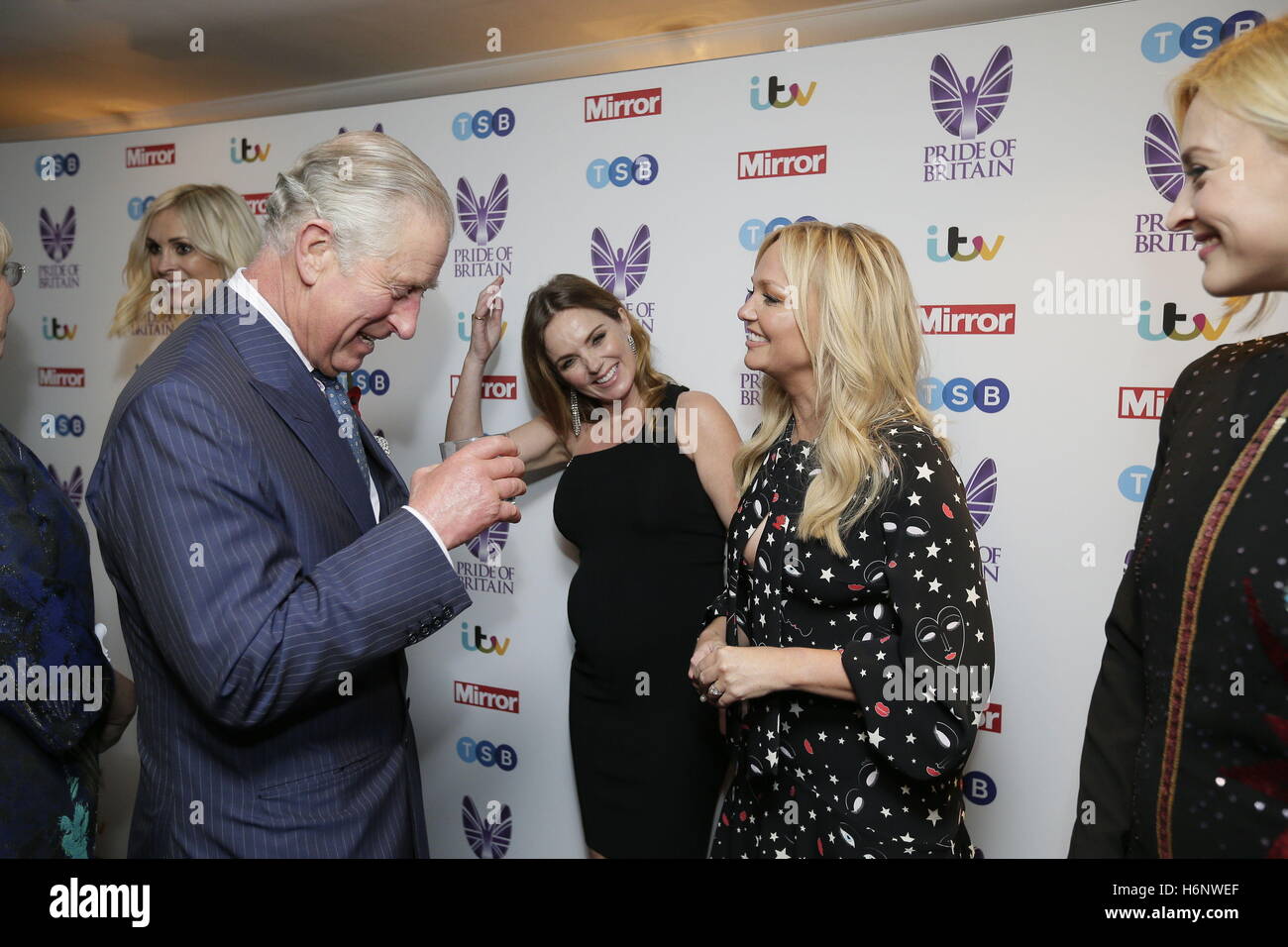 The Prince of Wales speaks with former Spice Girls Geri Horner (centre ...