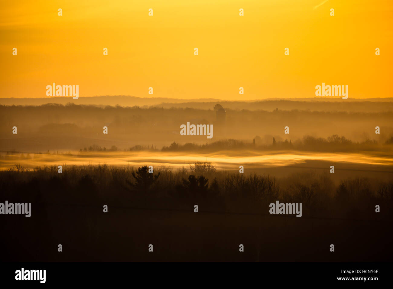 Early morning fog around a Wisconsin farm at dawn Stock Photo - Alamy