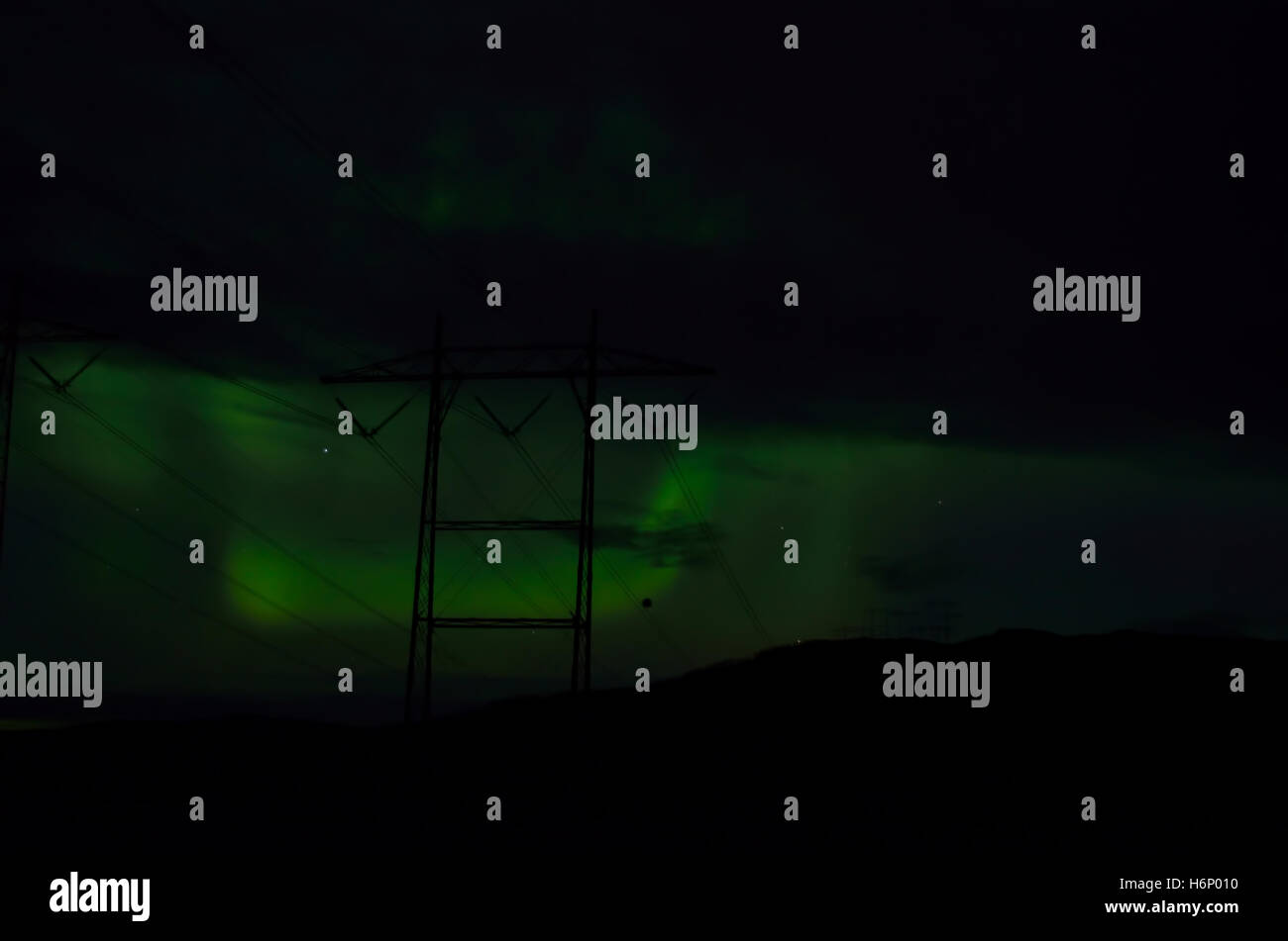 Beautiful Colorful Aurora Borealis Dancing On Night Sky Over Massive