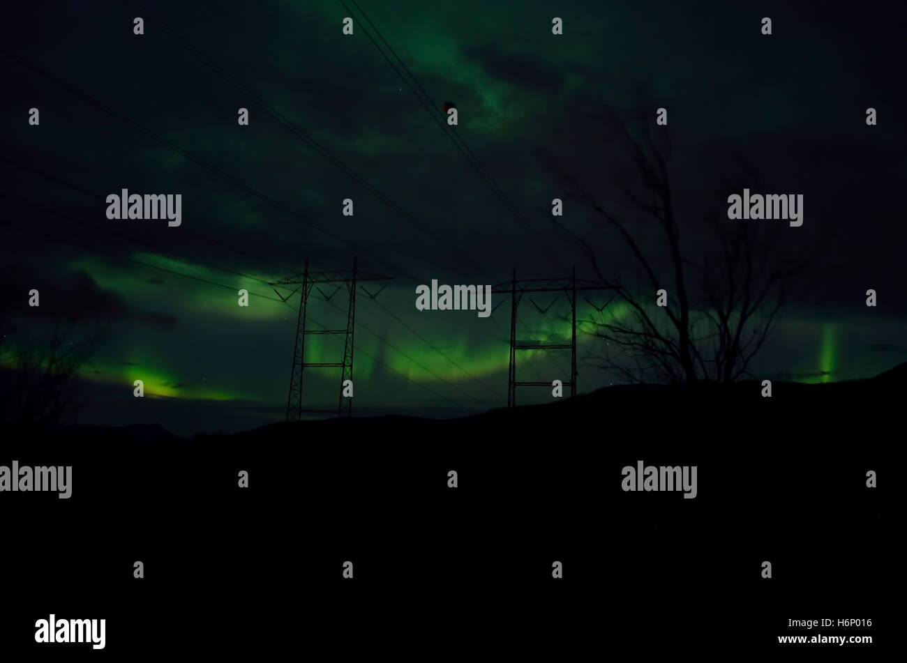 beautiful colorful aurora borealis dancing on night sky over massive ...