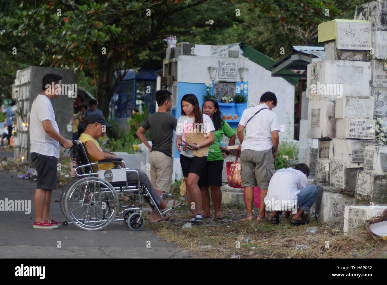 Makati, Philippines. 31st Oct, 2016. A family with person with ...