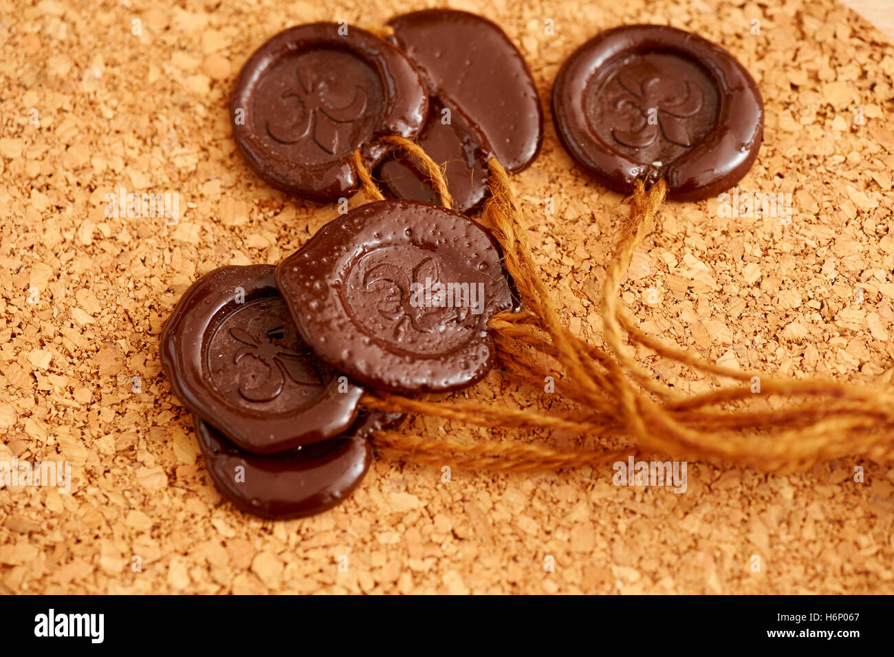 Seal of brown wax on the background surface balsa wood Stock Photo - Alamy
