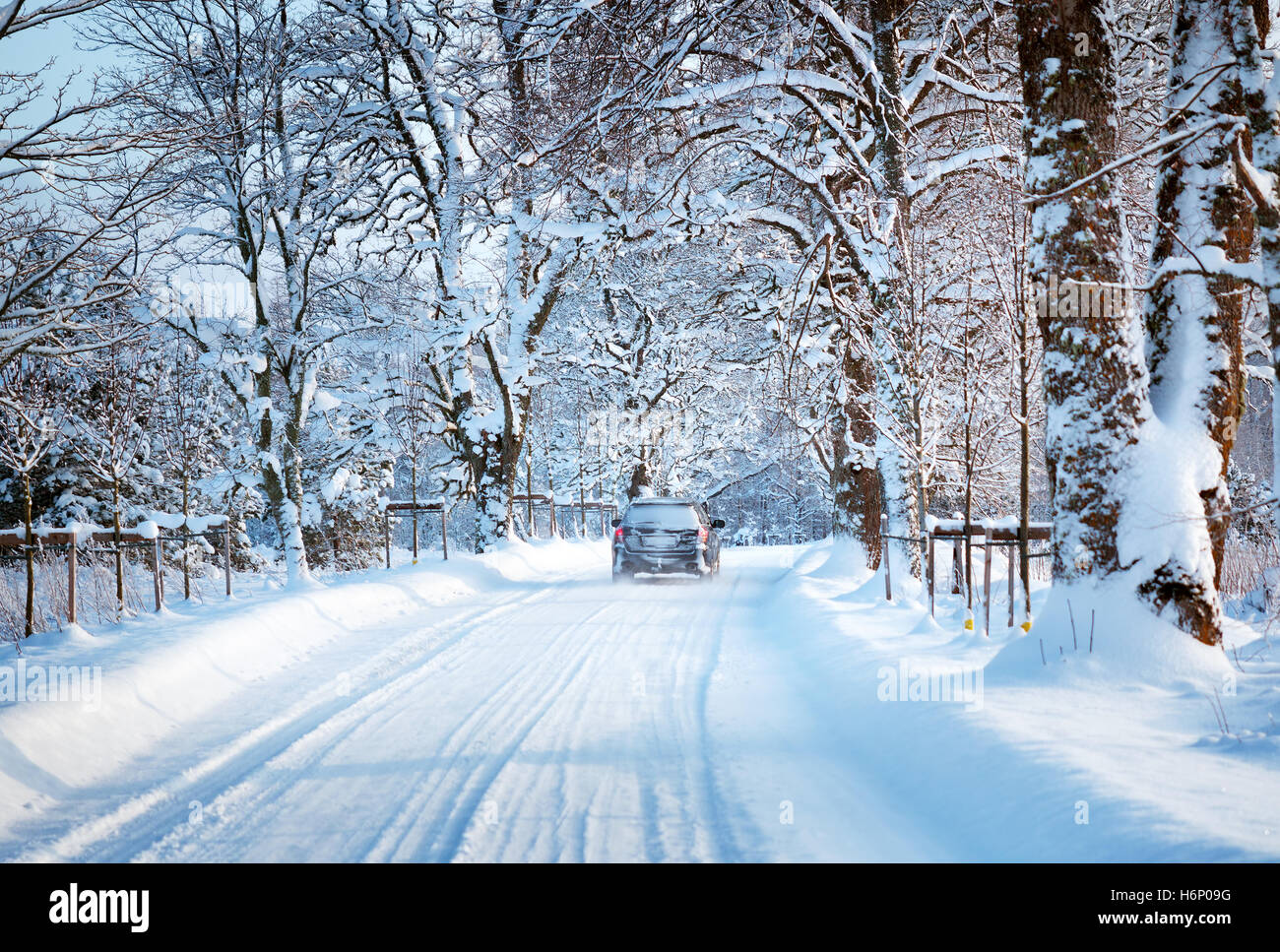 Alley in snowy morning Stock Photo - Alamy