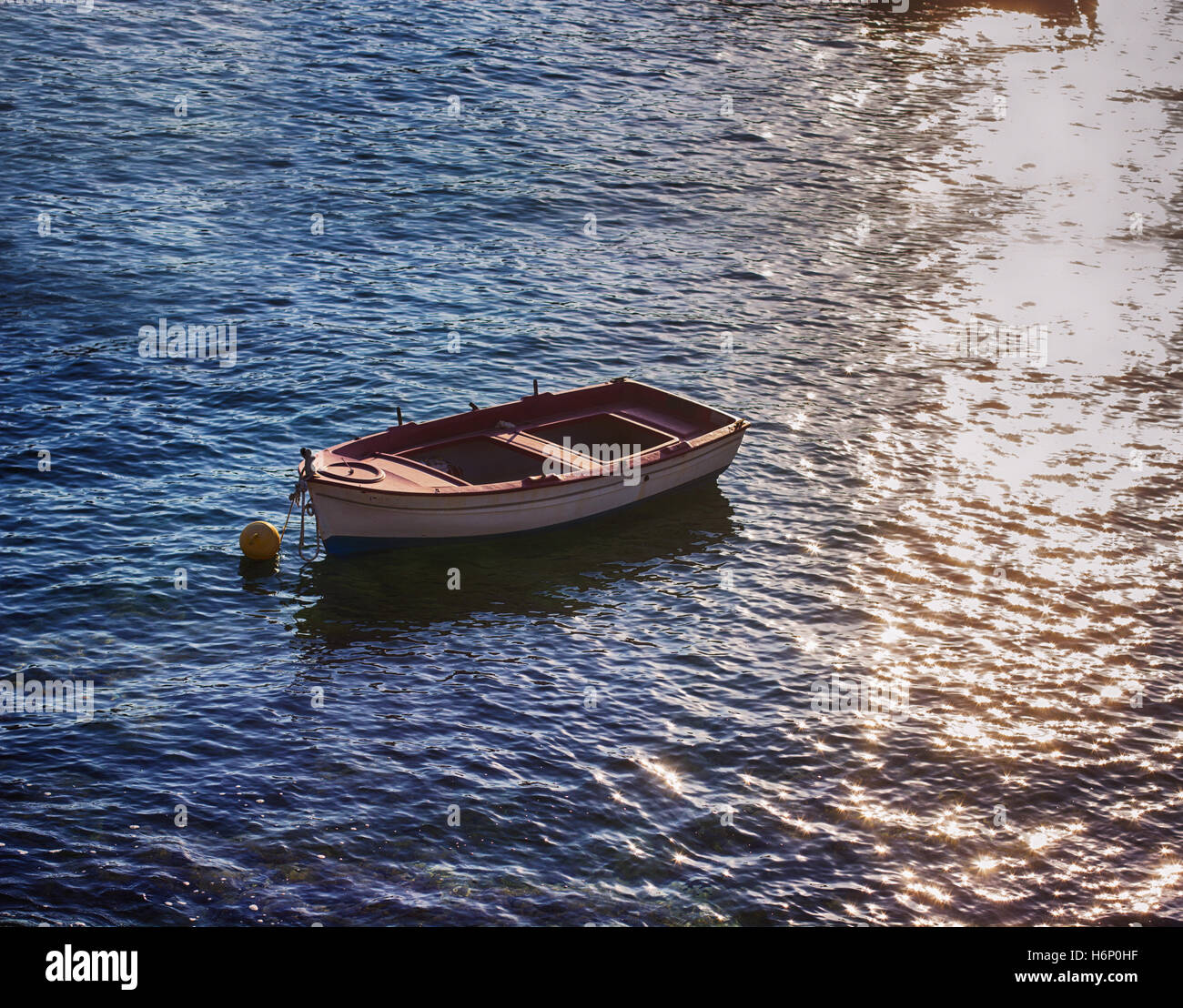 Wooden Boats on the sea ,sunlight reflection on water surface Stock ...