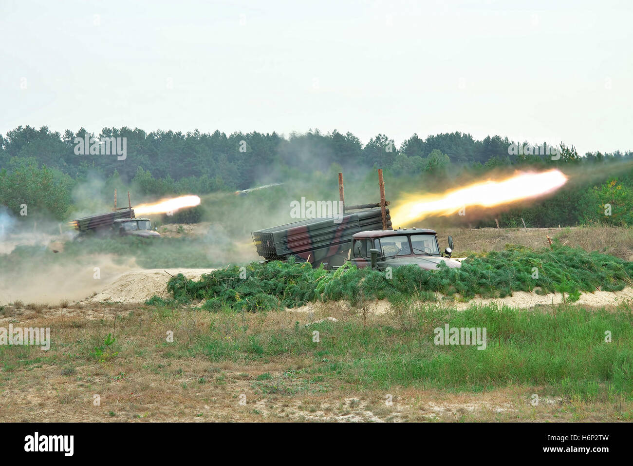 Rocket artillery firing the targets from defiladed position during ...