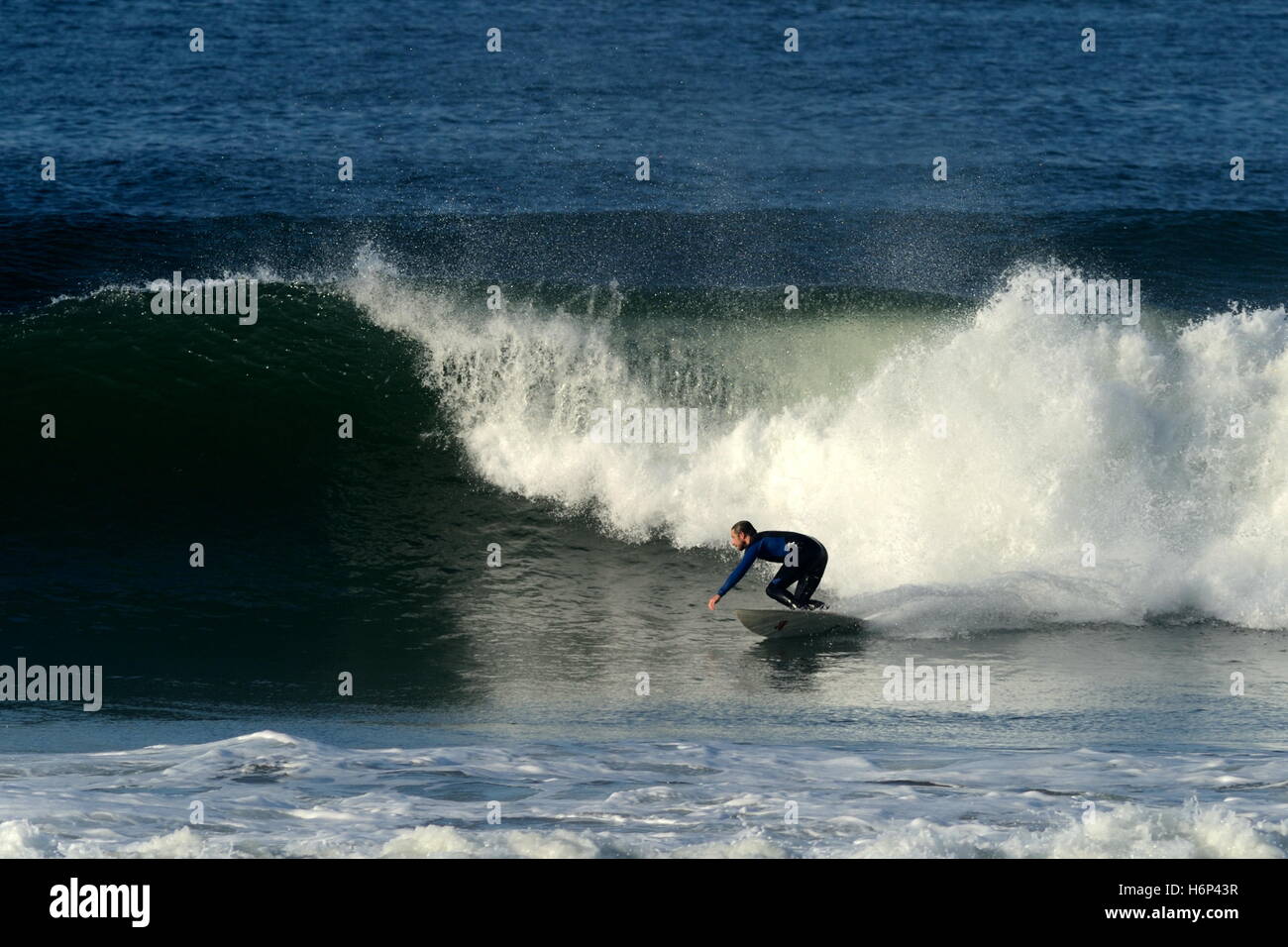 Action surfing in the west coast of Wales this beach break called Three ...