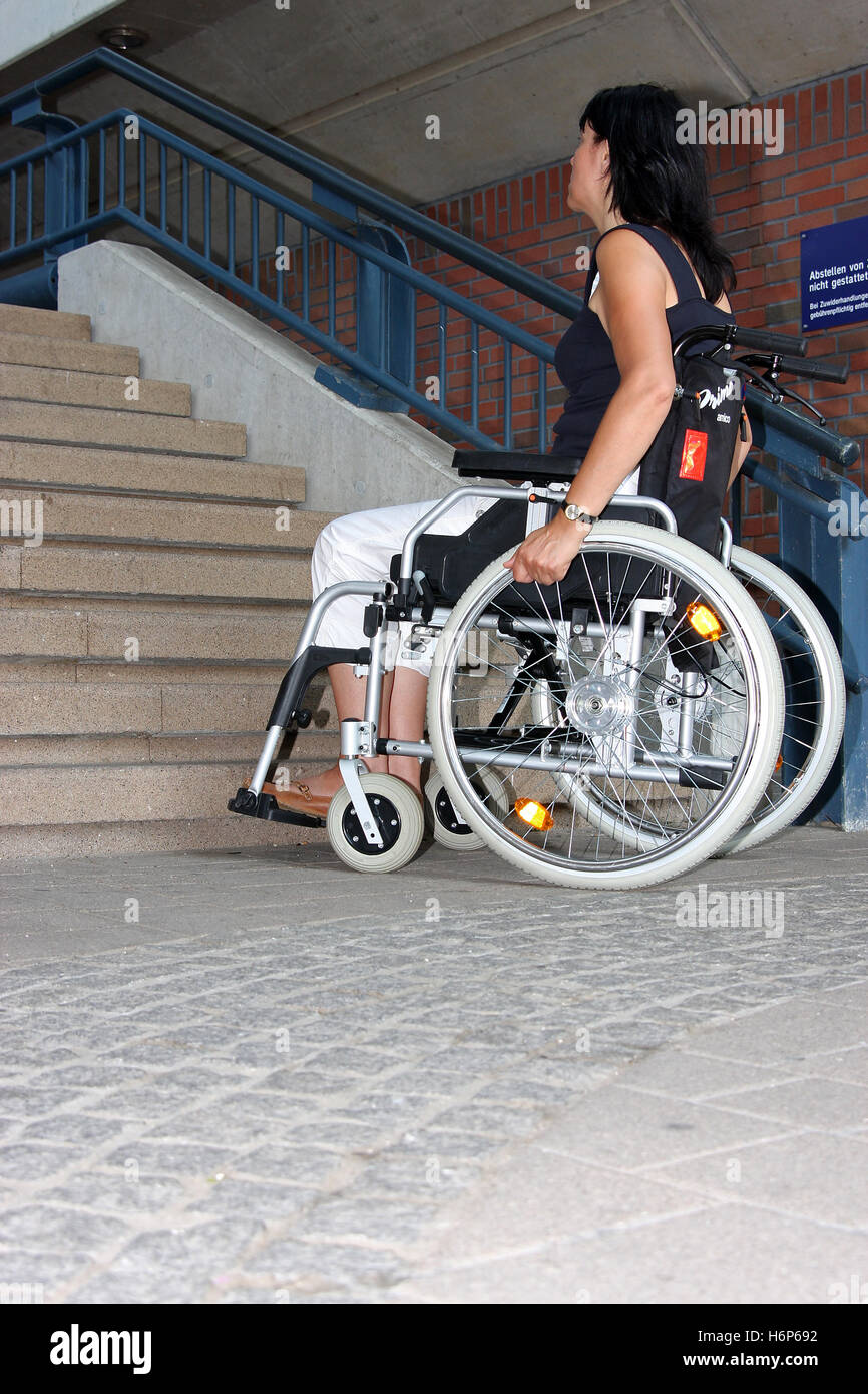 Woman in wheelchair hi-res stock photography and images - Alamy