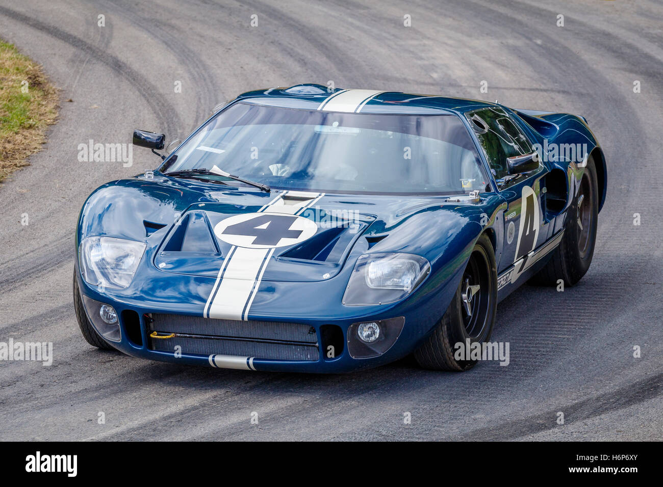 1966 Ford GT40 P/1055 with driver Gavin Henderson at the 2016 Goodwood ...