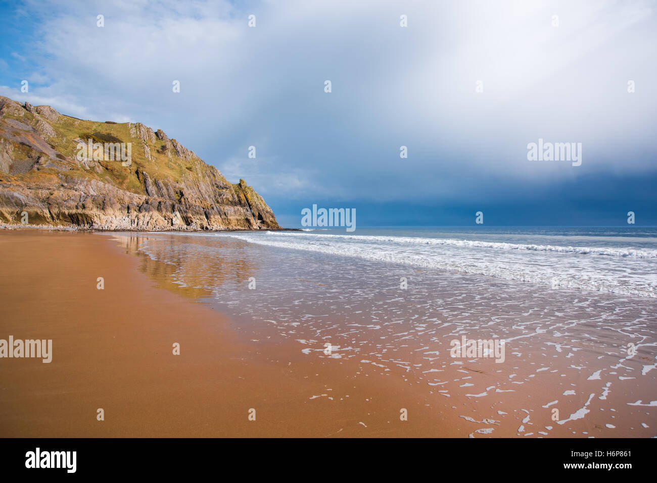 Distant storm over the North Devon coast seen from Pobbles Beach, Three ...