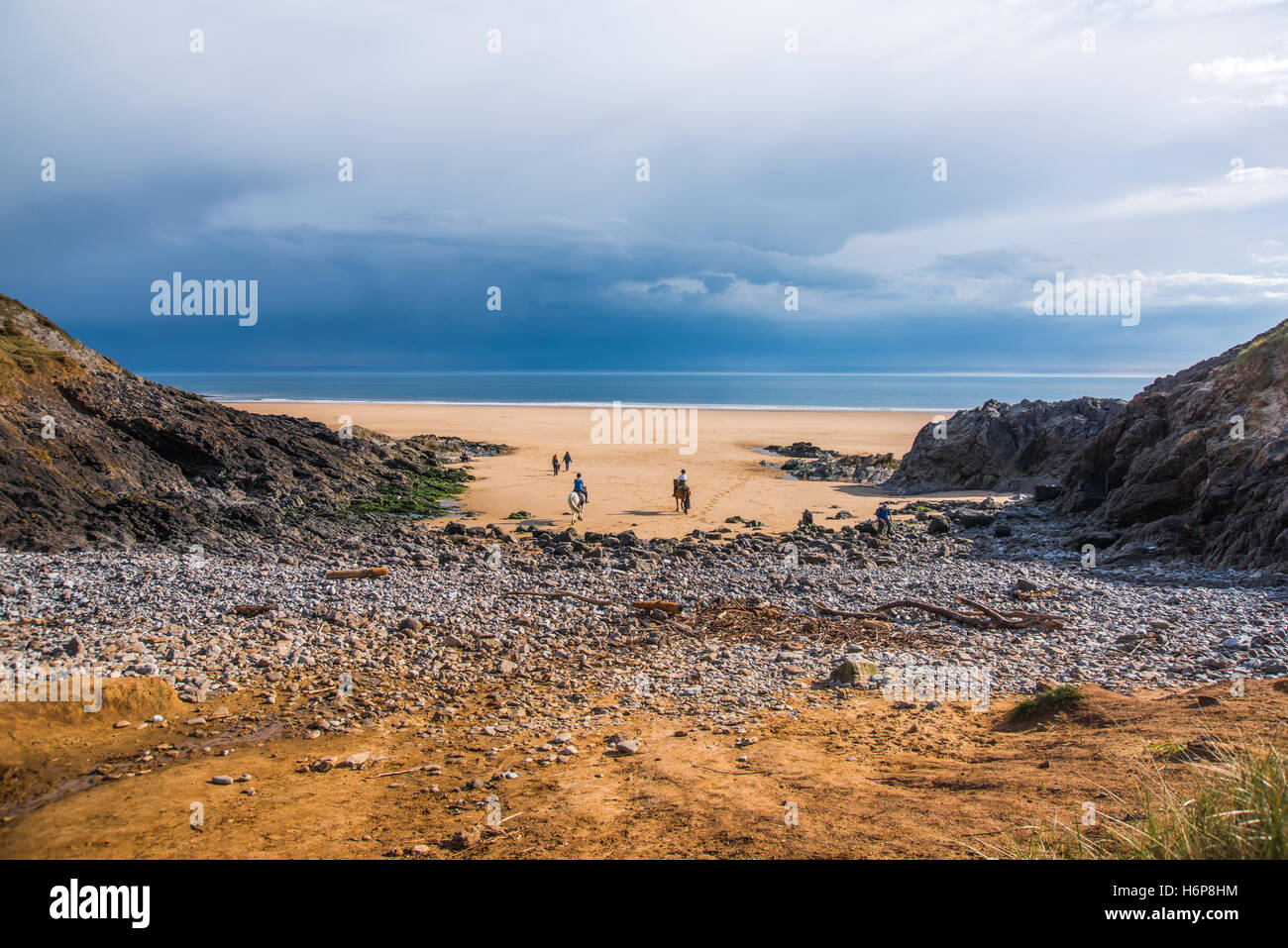 Distant storm over the North Devon coast seen from Pobbles Beach, Three ...