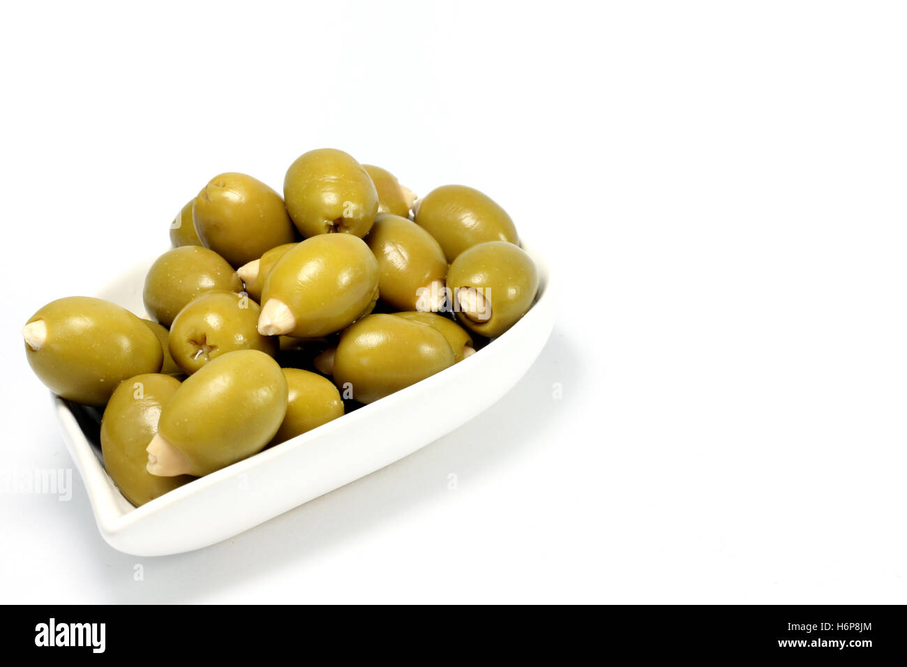 Stuffed green olive Cut Out Stock Images & Pictures - Alamy