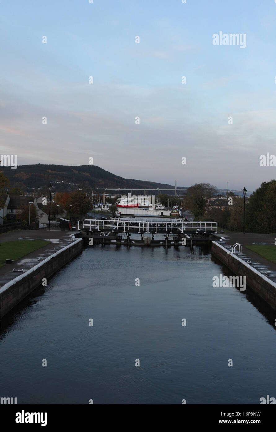 Muirtown Locks on Caledonian canal with distant Kessock Bridge ...