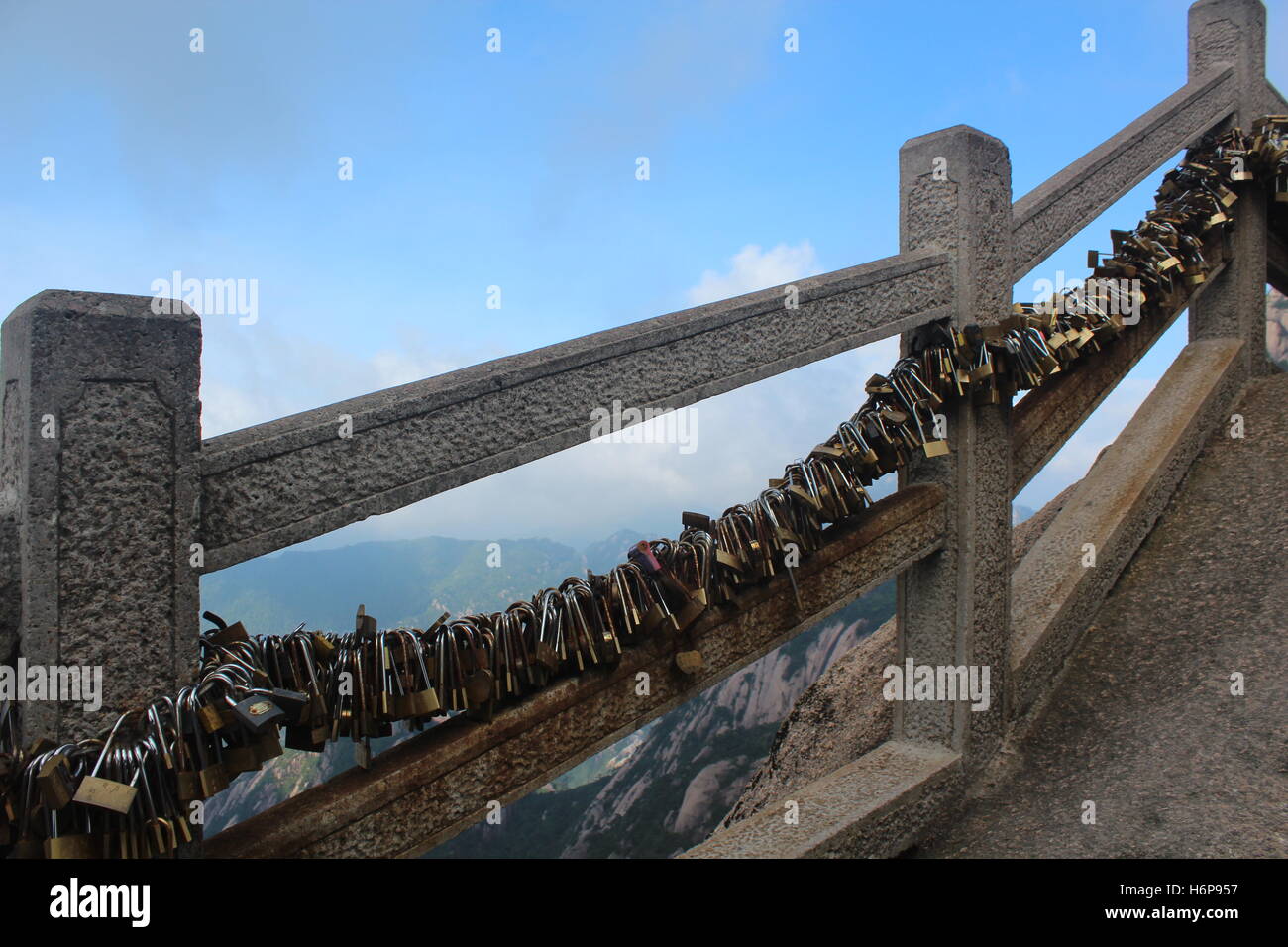 Hundreds of locks on a stone bridge in Huangshan, the Yellow mountains ...