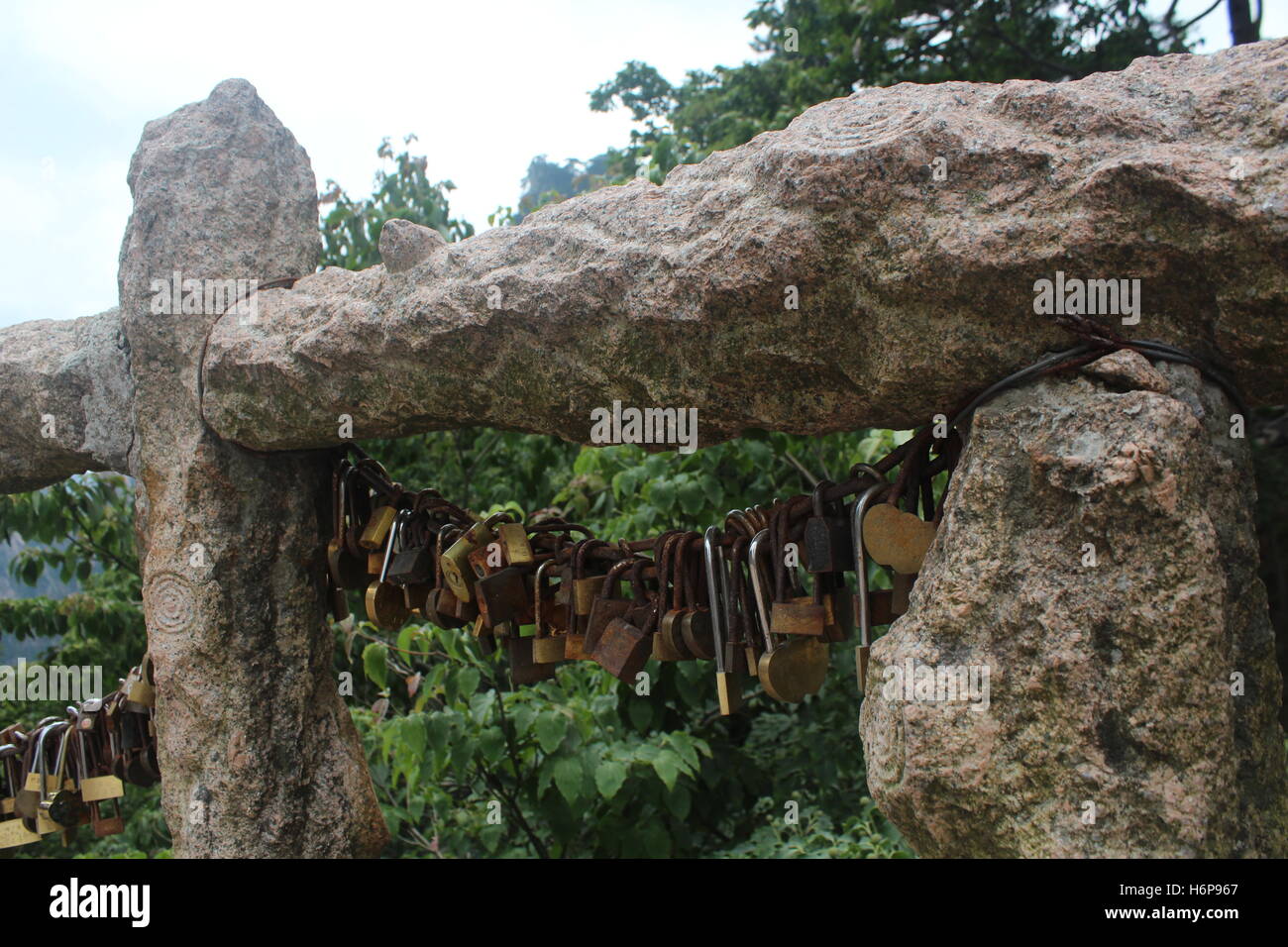 Locks on a stone bridge in Yellow mountains (Huangshan), Anhui province ...