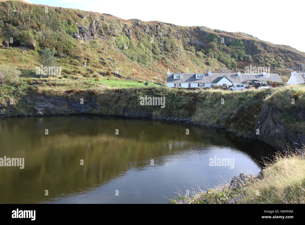 Flooded slate quarry Cullipool Isle of Luing Scotland September 2013 ...