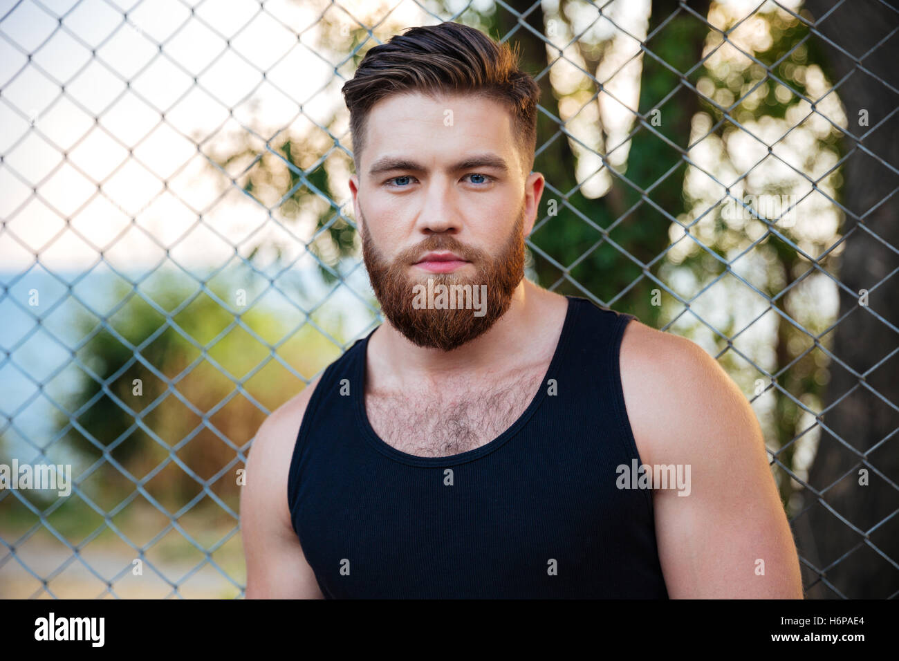 Attractive bearded man standing outdoors hi-res stock photography and ...