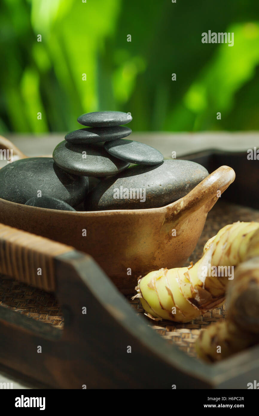 close up view of gray stones and ginger on color back Stock Photo - Alamy