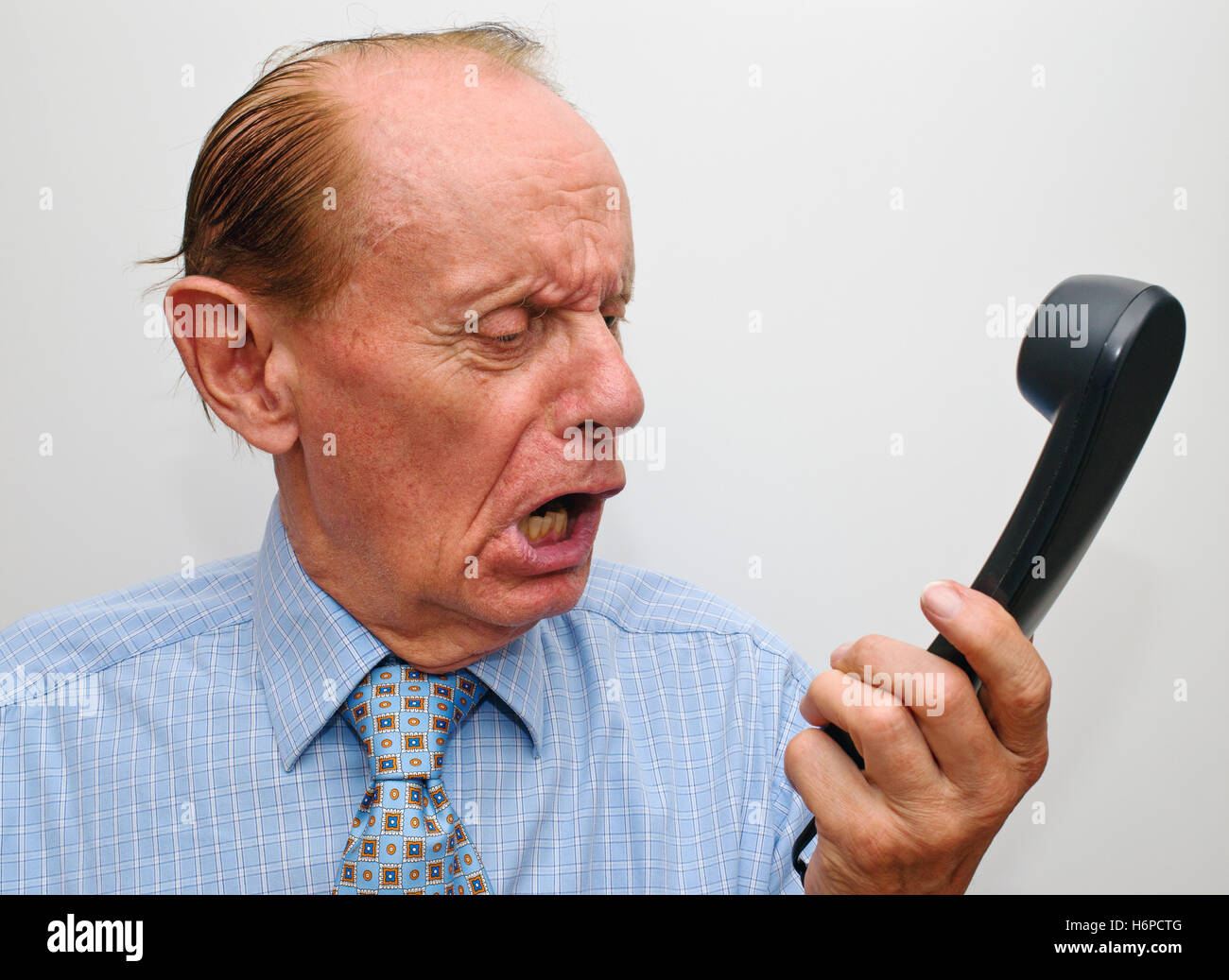 Speaking on phone loud hi-res stock photography and images - Alamy
