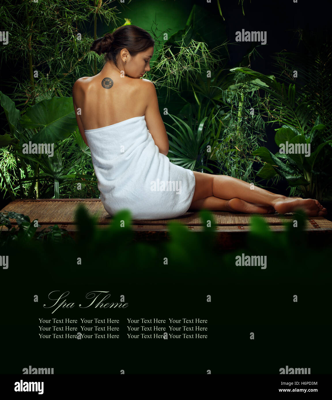 View of nice young woman meditating in spa tropic environment. Banner ...