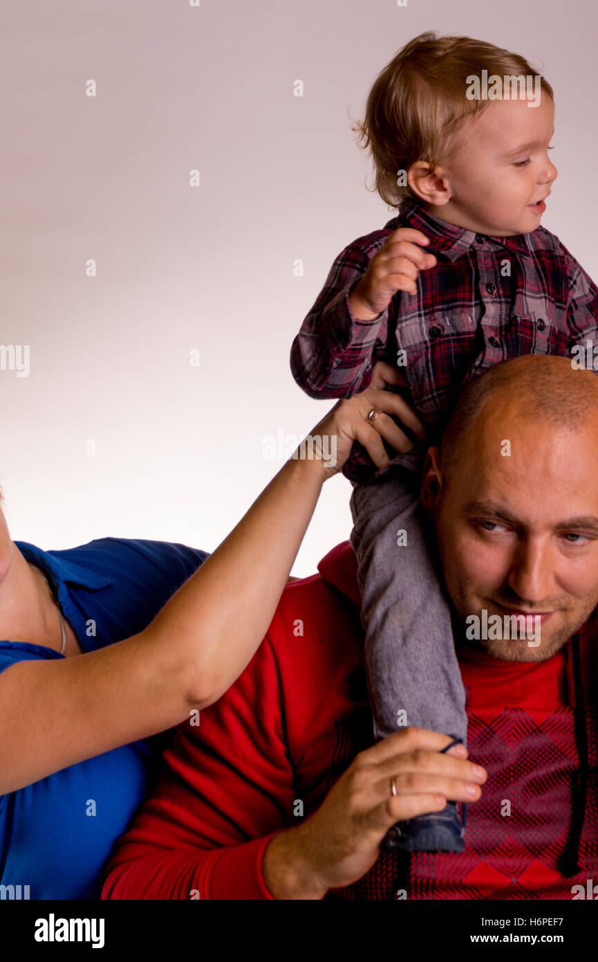 Father and son playing on white background Stock Photo - Alamy
