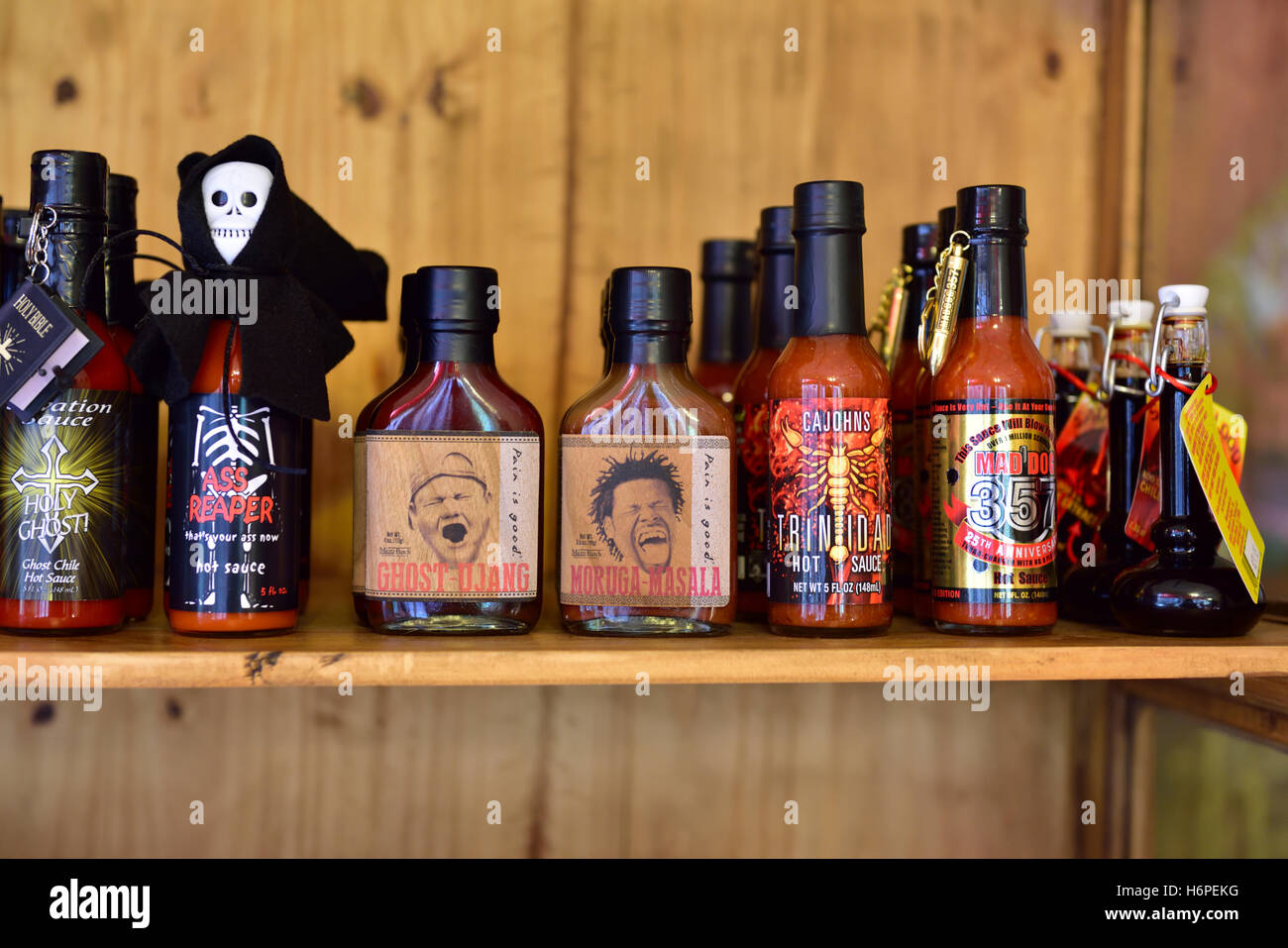 Bottles of hot sauce in Jeromes Ghost Pepper Co.,in old mining village ...