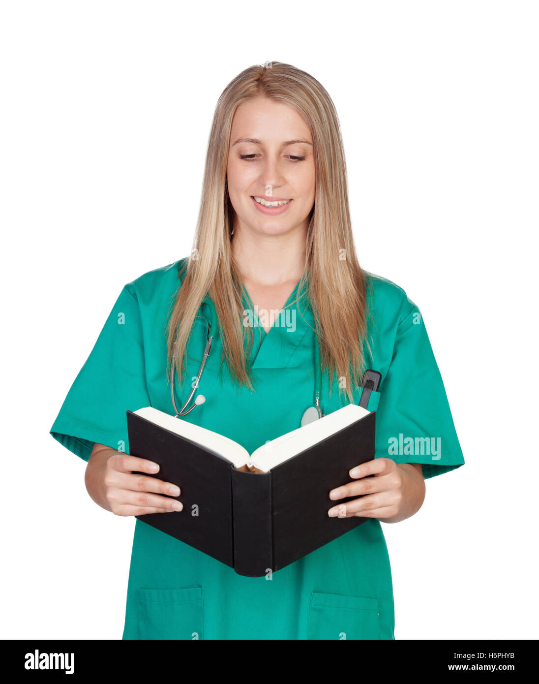 Atractive medical girl reading a book isolated on a white background ...