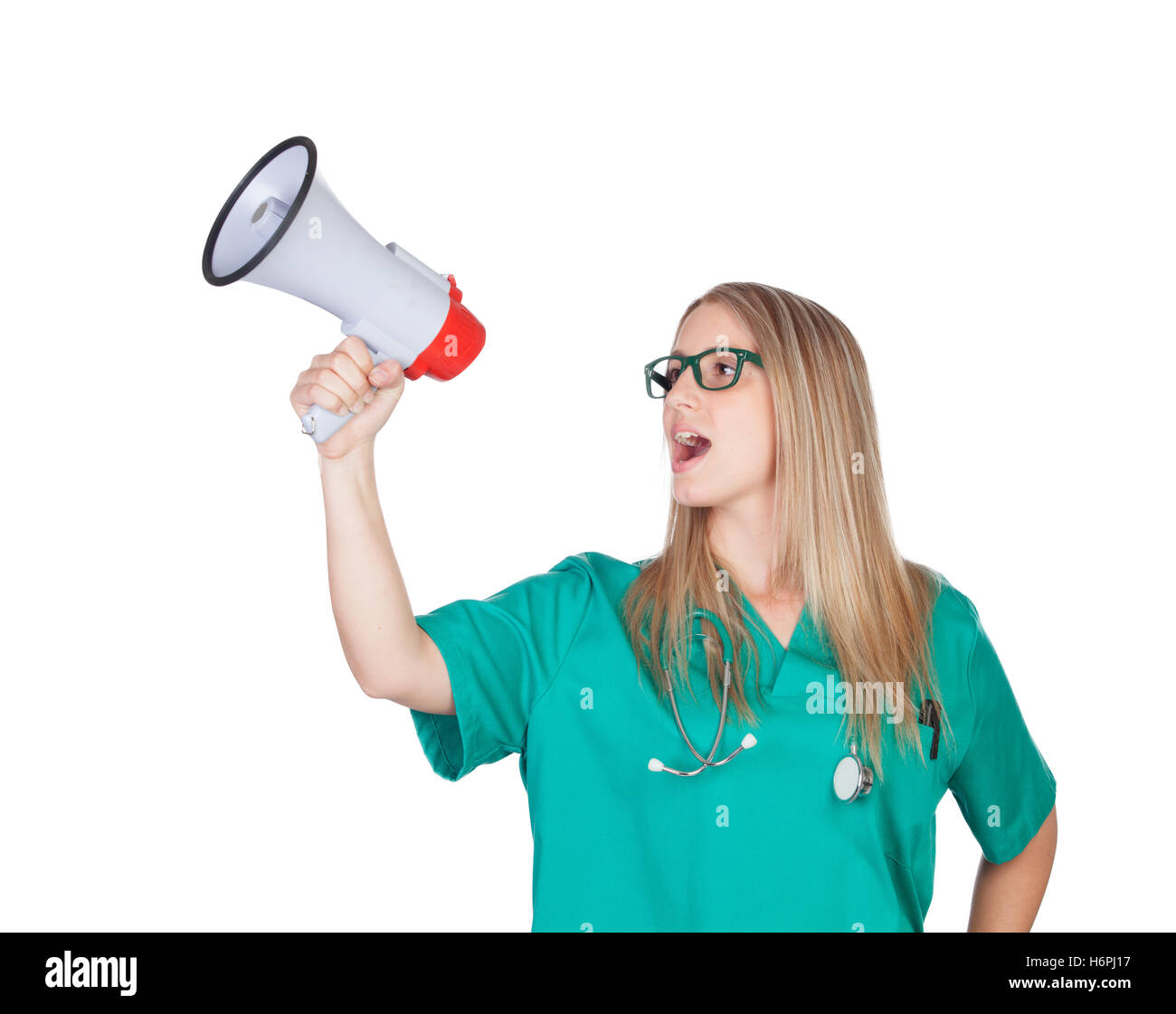 Atractive medical girl with a megaphone isolated on a white background ... Atractive medical girl with a megaphone isolated on a white background ...