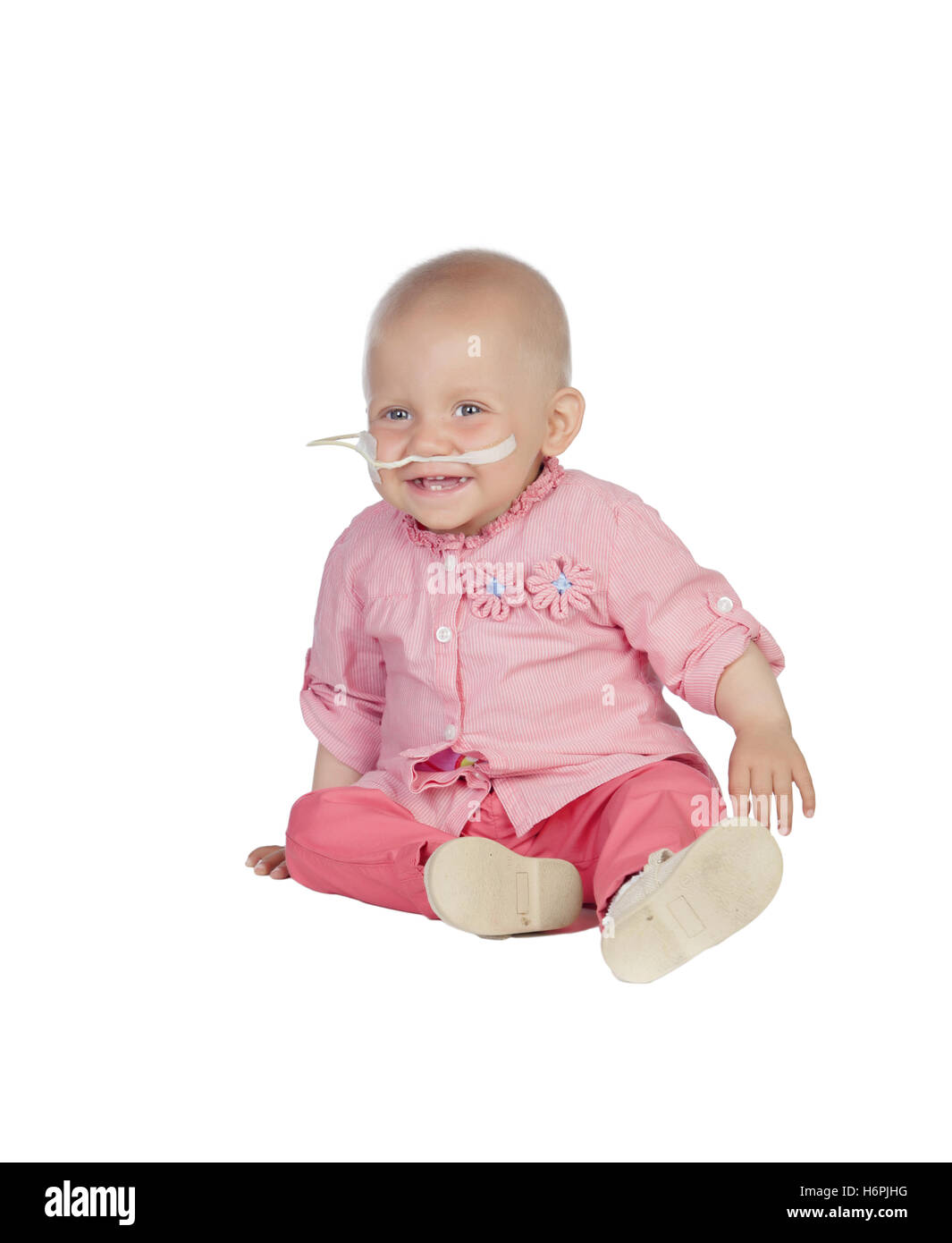 Adorable baby without hair beating the disease isolated on white ...