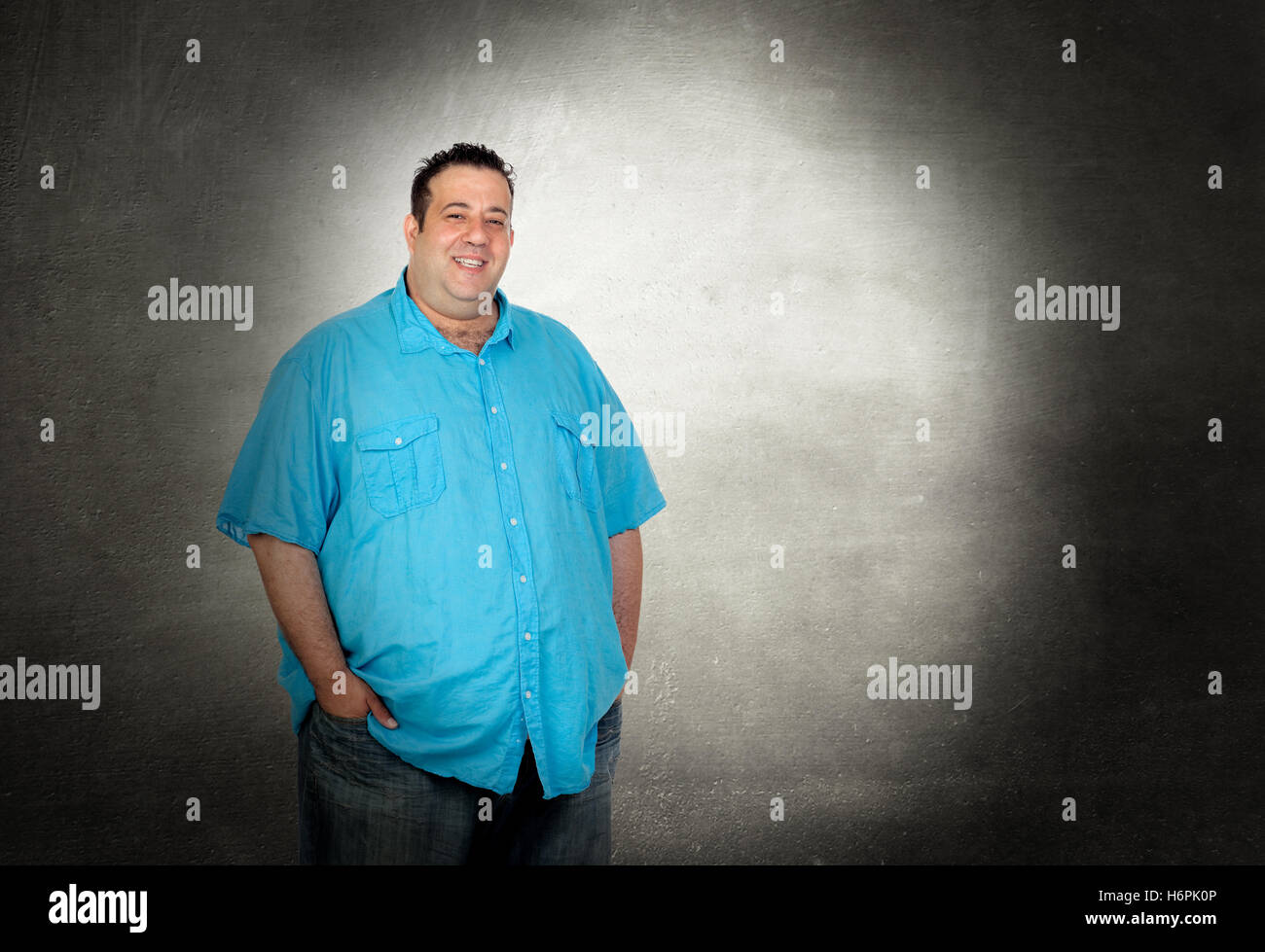 Fat man blue shirt hi-res stock photography and images - Alamy