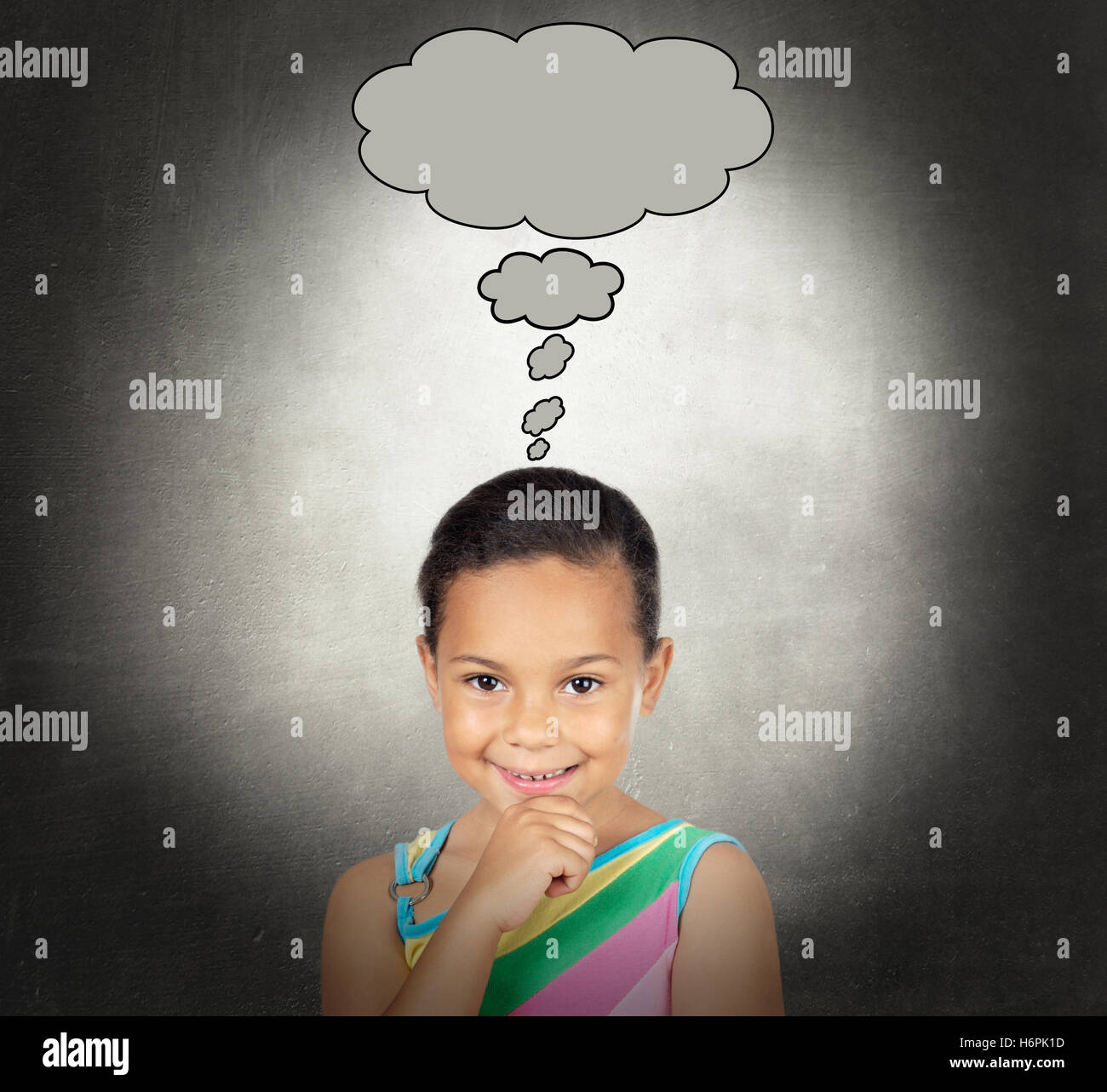 Doubtful little girl with a bubble on a over gray background Stock ...