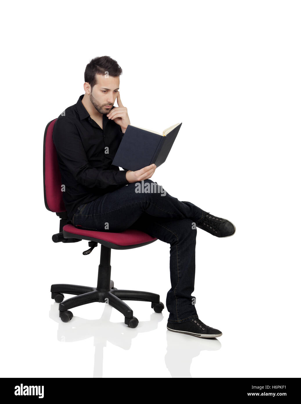 Young Man Reading Book Over White Background Stock Photo - Alamy