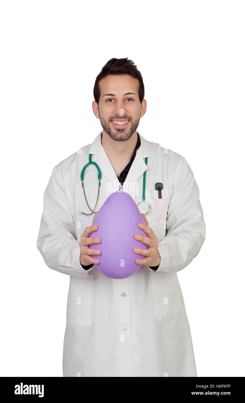 Young Male Doctor Holding Balloon Over White Background Stock Photo - Alamy