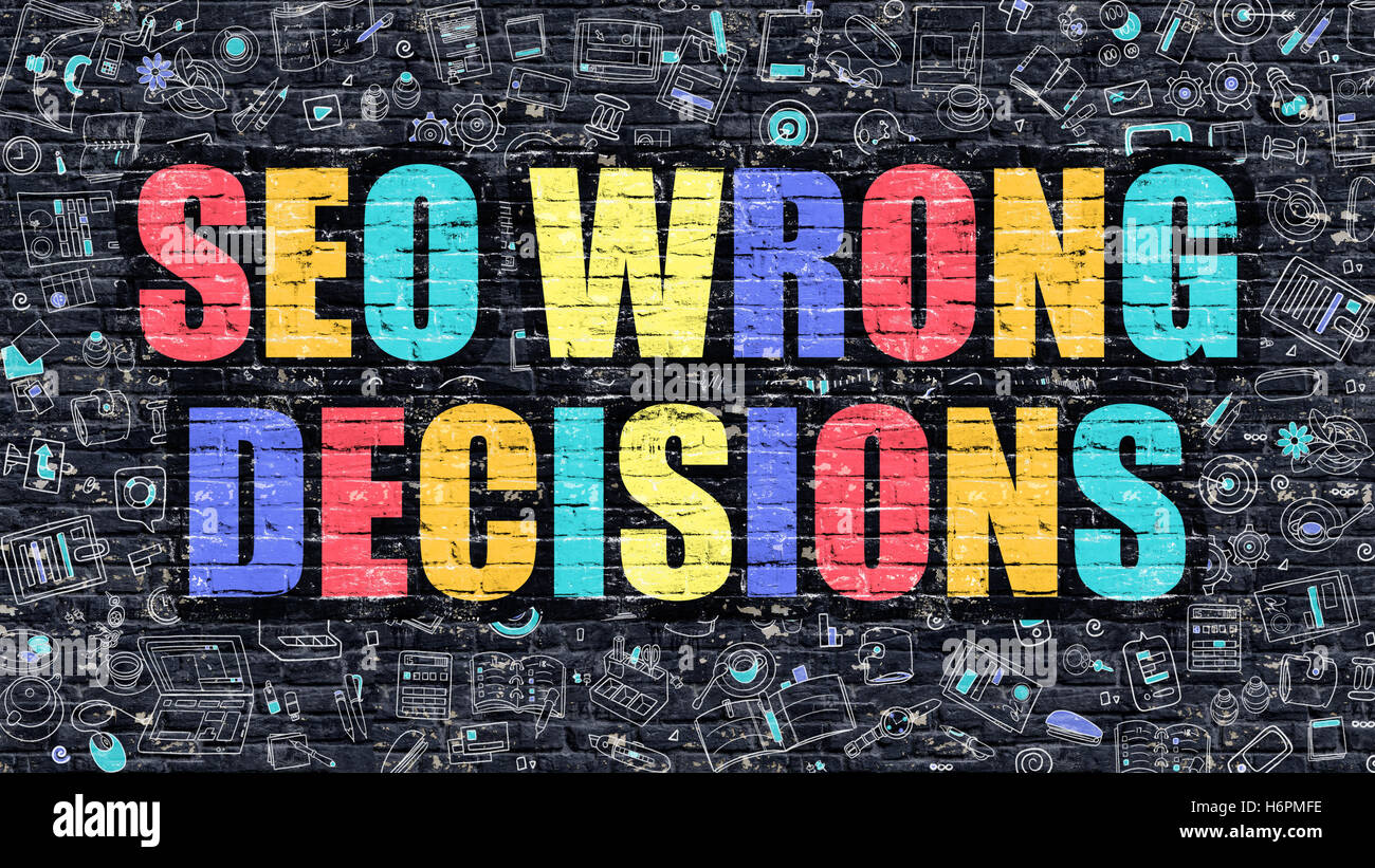 SEO Wrong Decisions on Dark Brick Wall Stock Photo - Alamy