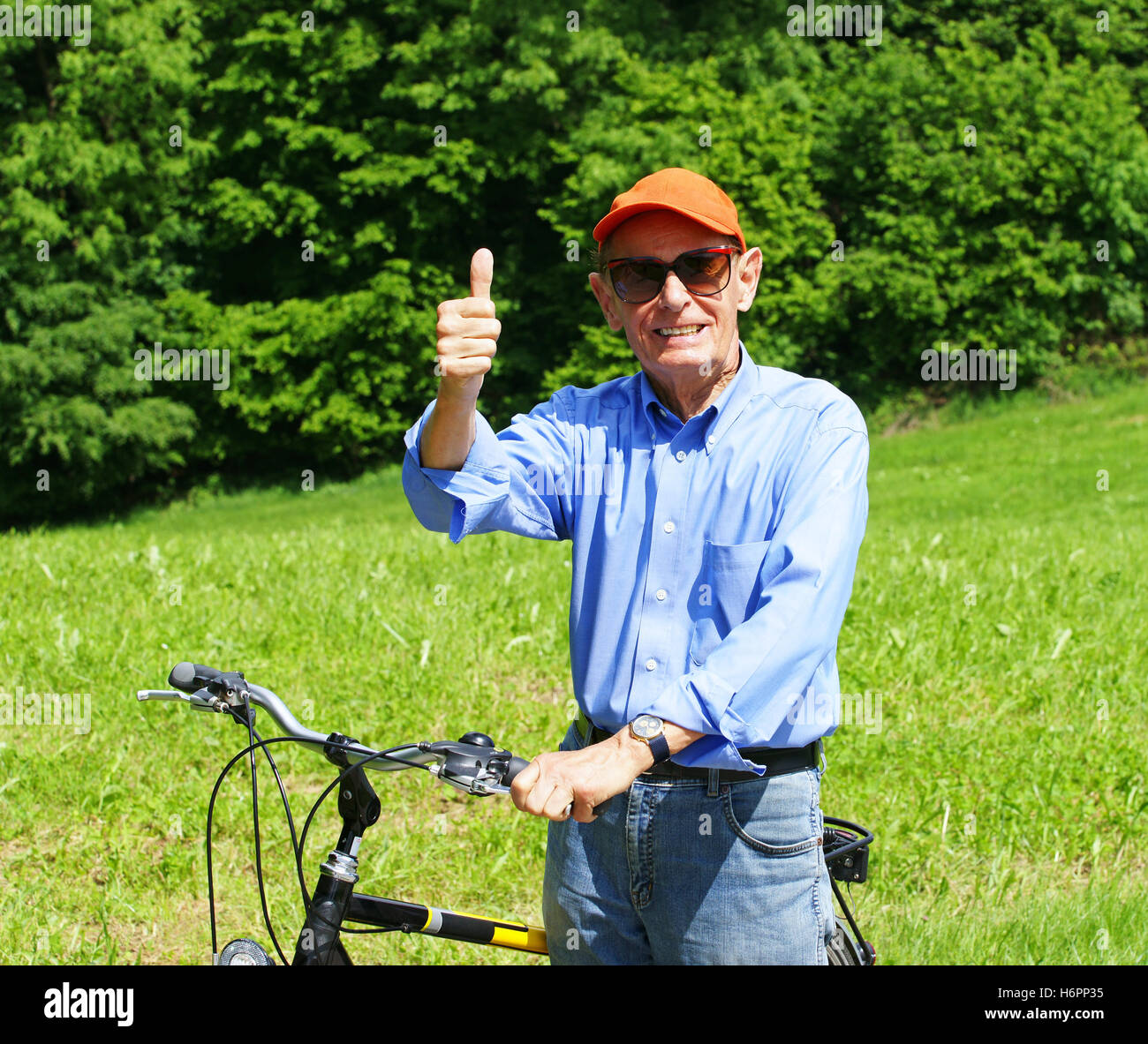 senior cycling in nature Stock Photo - Alamy