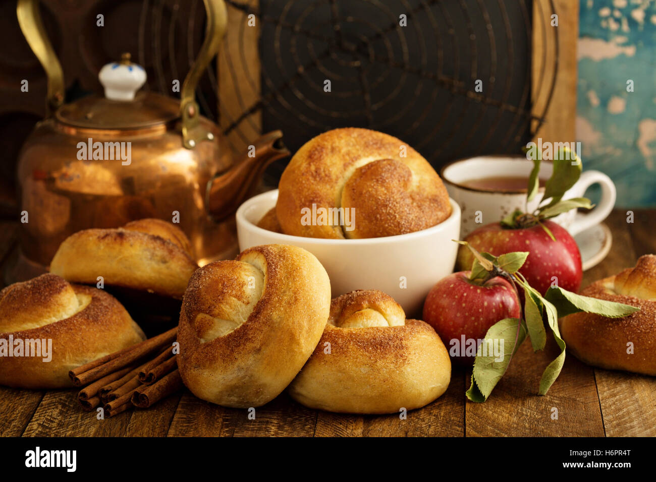 Apple rolls with cinnamon Stock Photo - Alamy