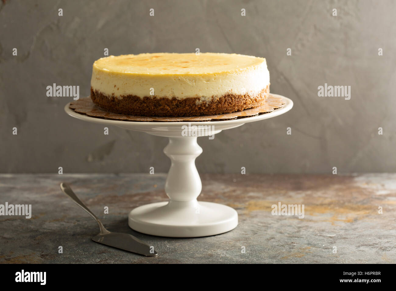 New York cheesecake on a cake stand Stock Photo - Alamy