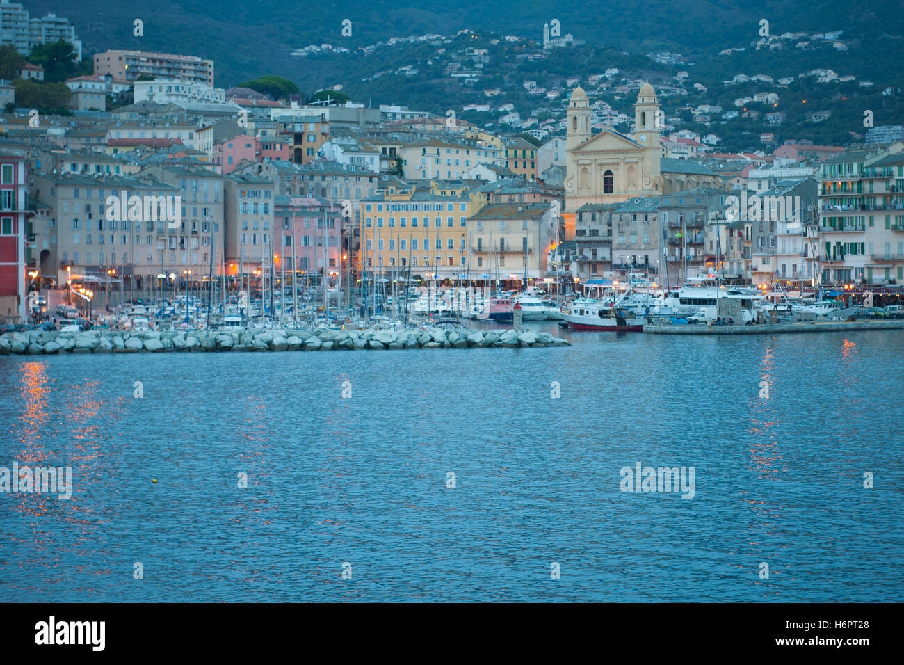 The old port (the Vieux Port) at sunset, in Bastia, Corsica, France ...