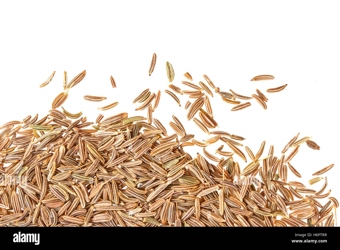 Cumin seeds isolated on white background Stock Photo - Alamy