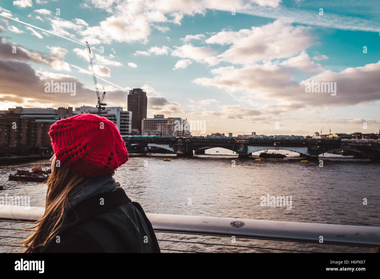 Photo of Girl crossing Millennium Bridge in London Stock Photo - Alamy