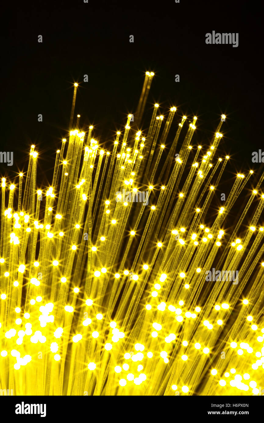 close up view of amber (yellow) fibre optic strands conceptual use for ...
