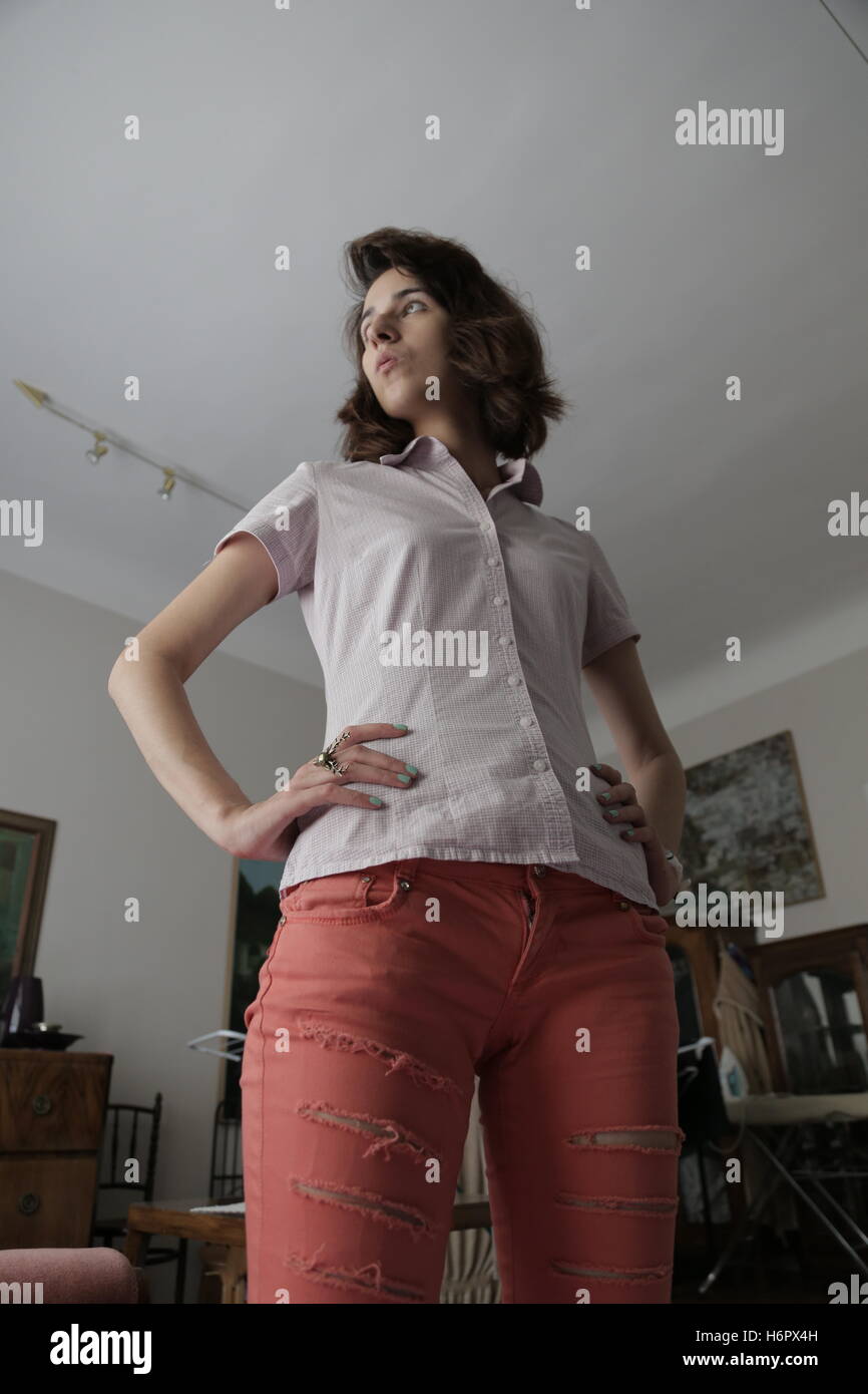 Girl standing and staring at the distance Stock Photo - Alamy