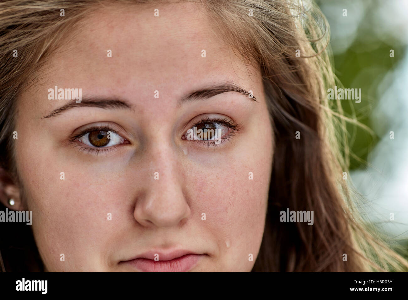 Teary eyed hi-res stock photography and images - Alamy