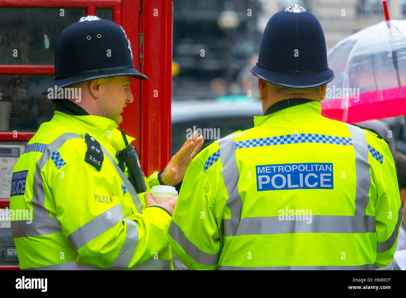 London Police Officers at Piccadilly Circus in London Stock Photo - Alamy
