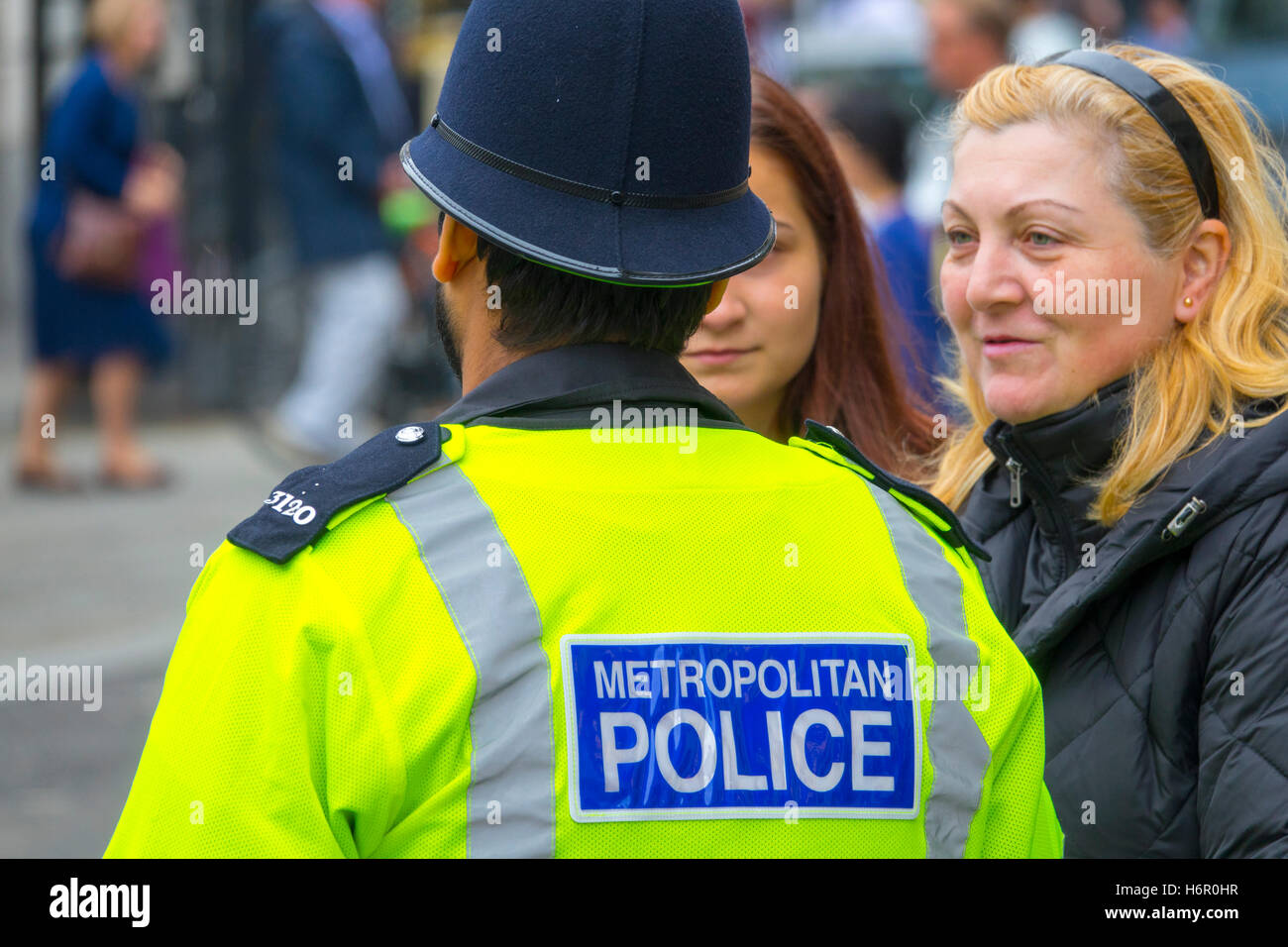 Friendly London Metropolitan Police Officer Stock Photo - Alamy