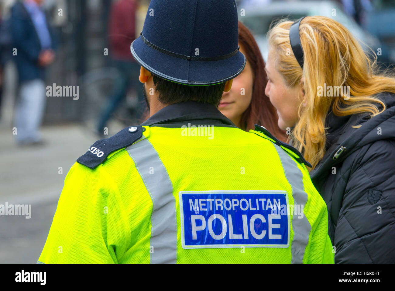 Friendly London Metropolitan Police Officer Stock Photo - Alamy