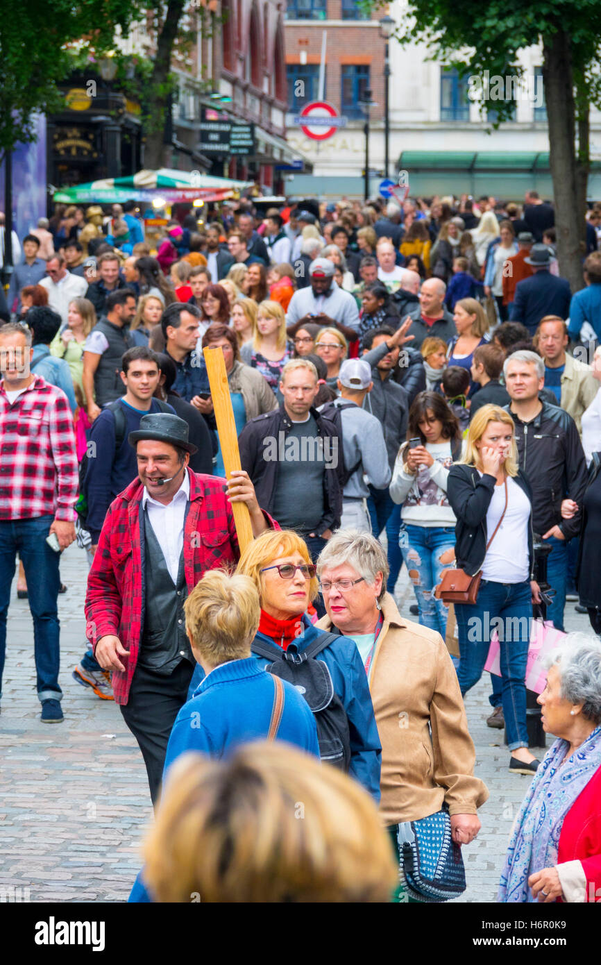 The very busy place of Covent Garden in London - huge crowd of tourists ...